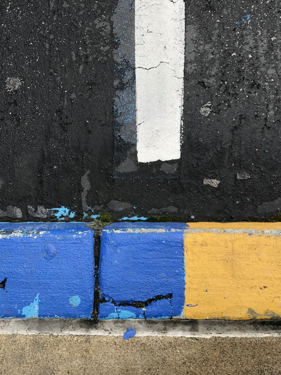 Blue Curb Running Over the Line into Yellow | Brotherly Love