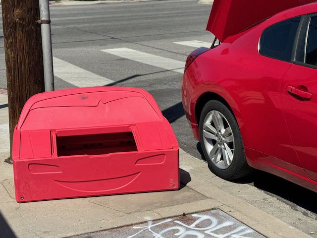 Street Photography: Picking Up an Extra Trunk, LA, 2025