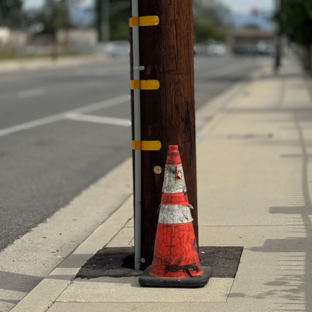Traffic Cone Series: Traffic Cone in Front of Growth Chart, LA, 2026